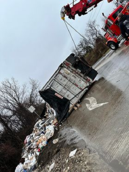Truck Hauling Garbage Overturns, Officers Discover Problems ...